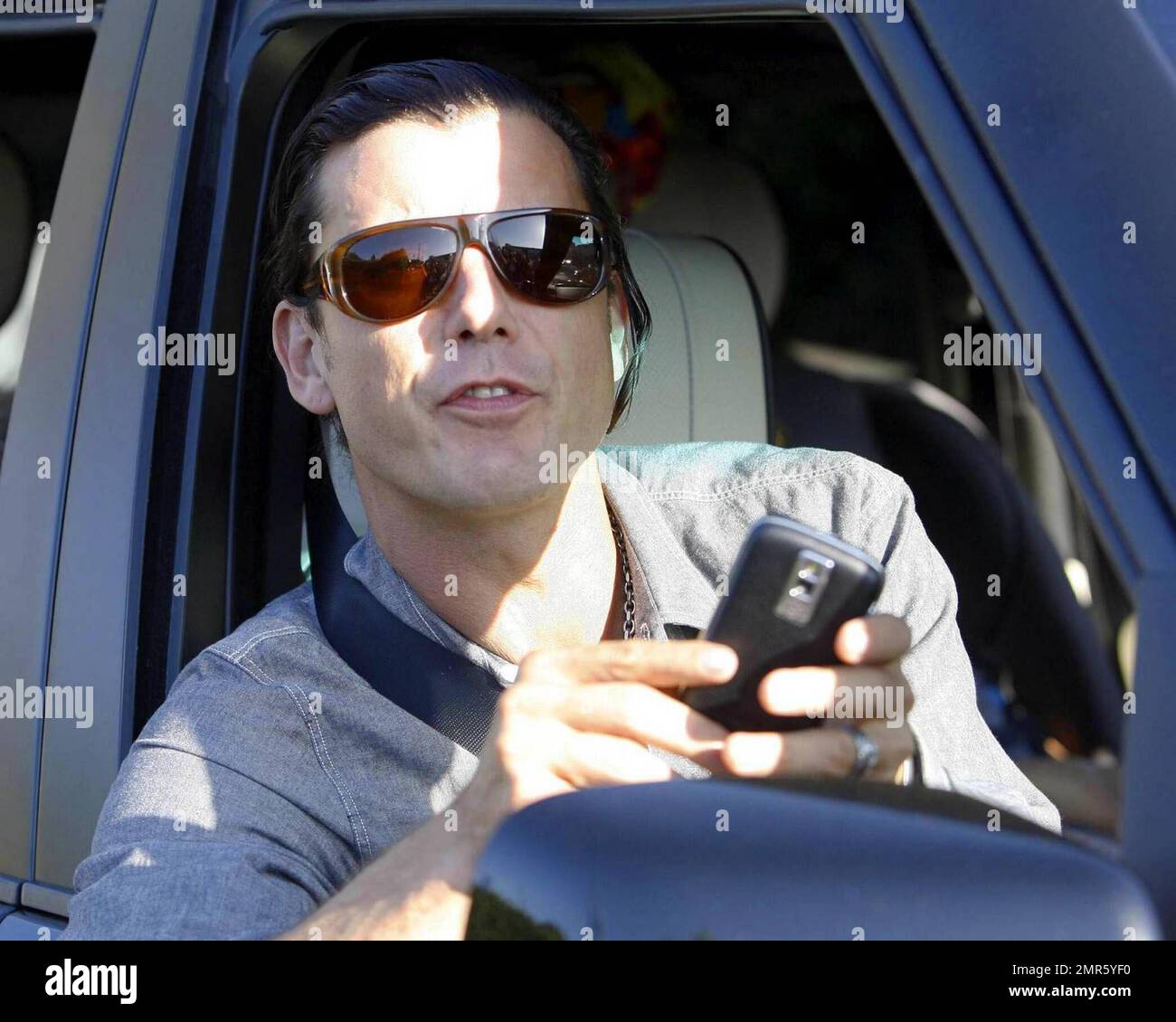 No Doubt singer Gwen Stefani waves to the cameras as she leaves her ...