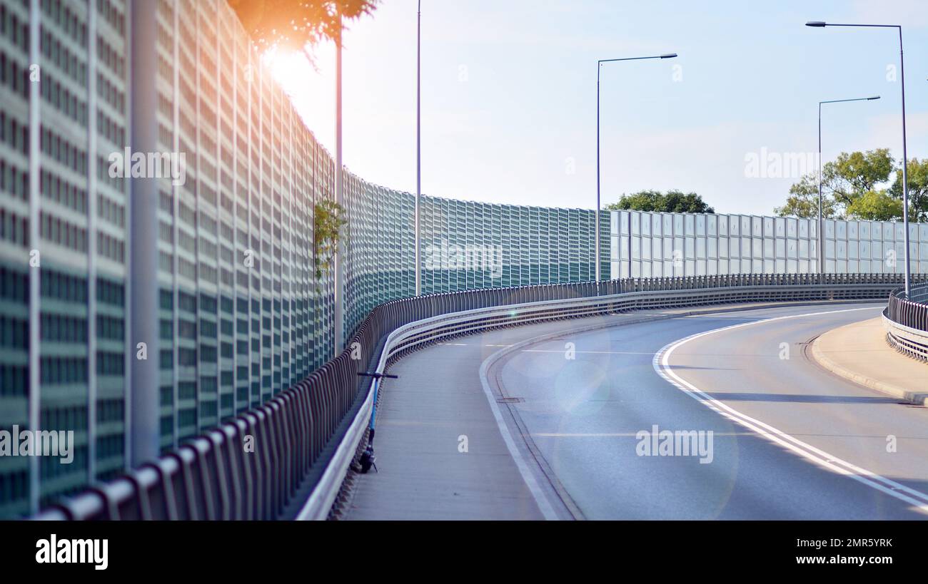 Soundproof shield. High noise insulation panels on the road Stock Photo ...