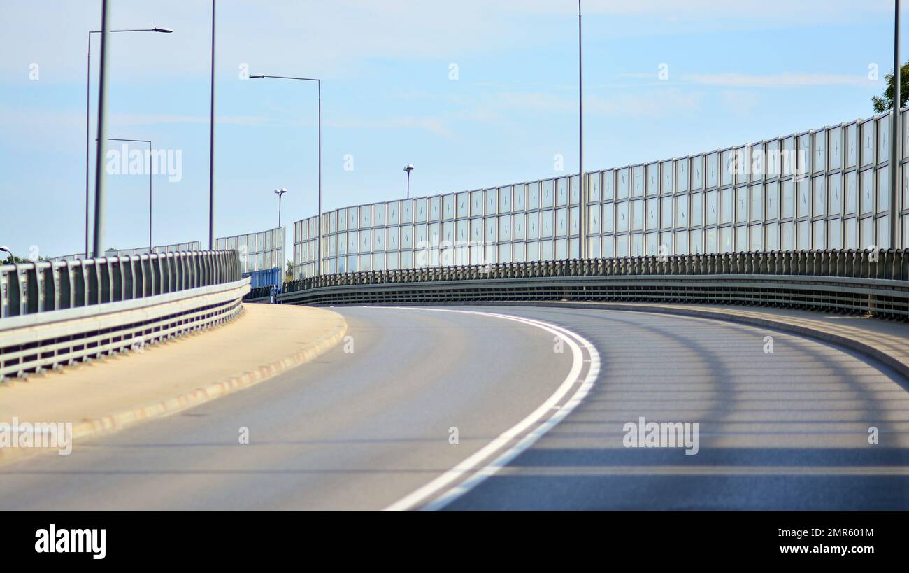 Soundproof shield. High noise insulation panels on the road Stock Photo ...