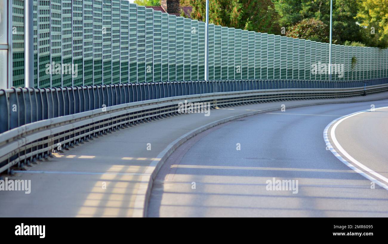 Soundproof shield. High noise insulation panels on the road Stock Photo ...
