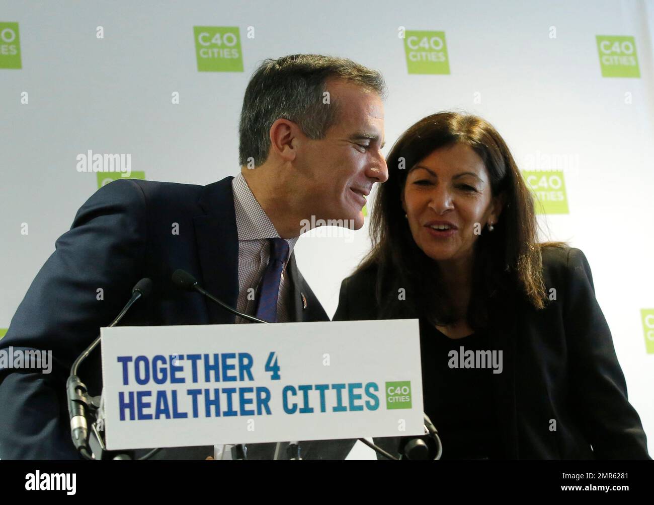 Loa Angeles mayor Eric Garcetti, left, and Paris mayor Anne Hidalgo ...