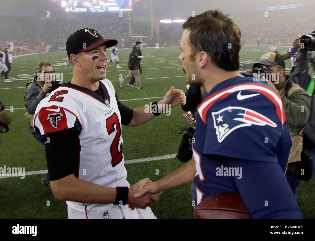 Atlanta Falcons quarterback Matt Ryan, left, and New England Patriots ...
