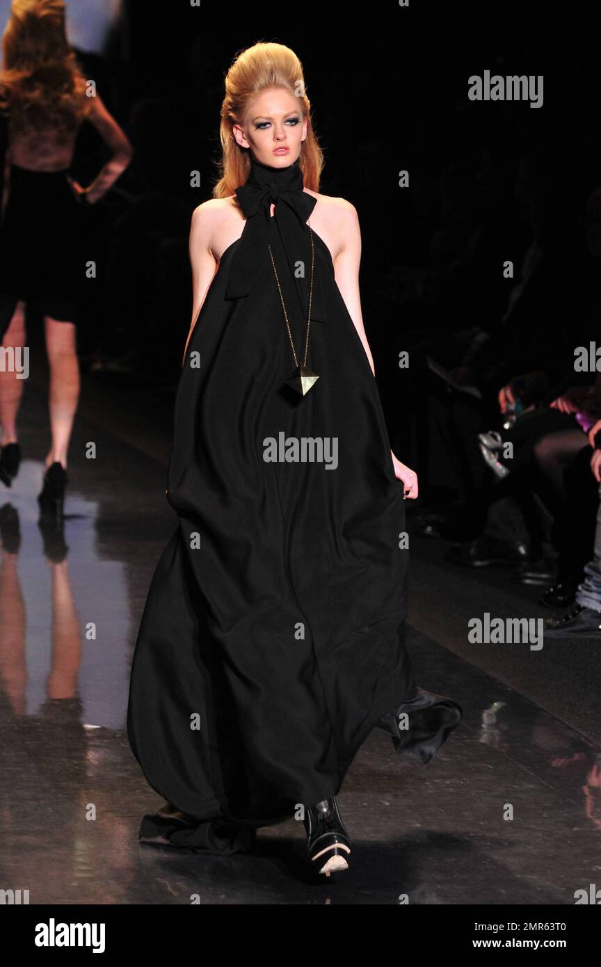 Singer and L.A.M.B. fashion designer Gwen Stefani walks the runway in a ...