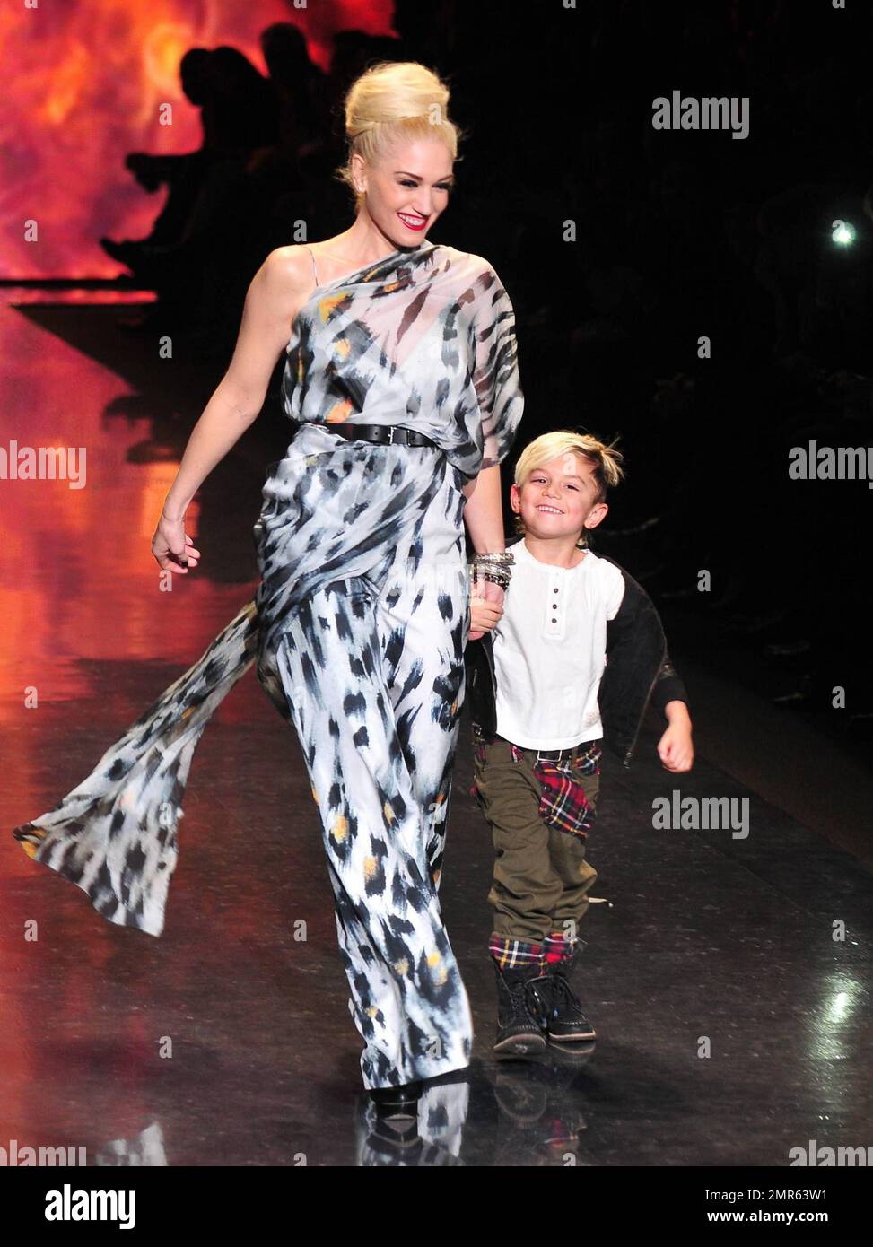 Singer and L.A.M.B. fashion designer Gwen Stefani walks the runway in a ...