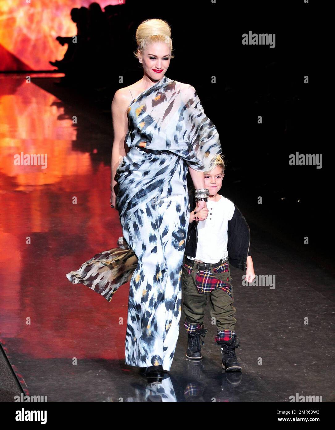 Singer and L.A.M.B. fashion designer Gwen Stefani walks the runway in a ...