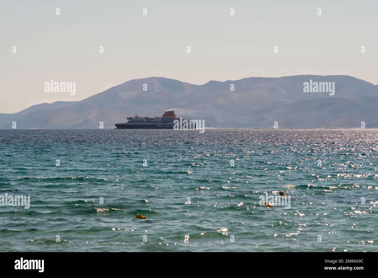 Ios, Greece - June 3 , 2021 : View of a ferry boat cruising the Greek ...
