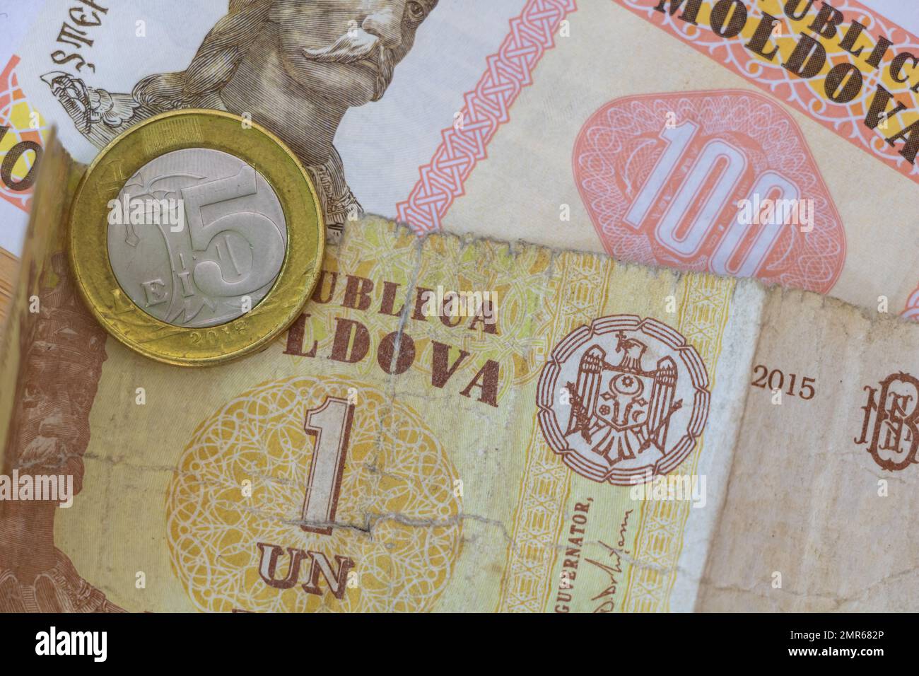 Moldovan Money in Focus: 5 Lei Coin and 100 and 1 Lei Banknotes Stock ...