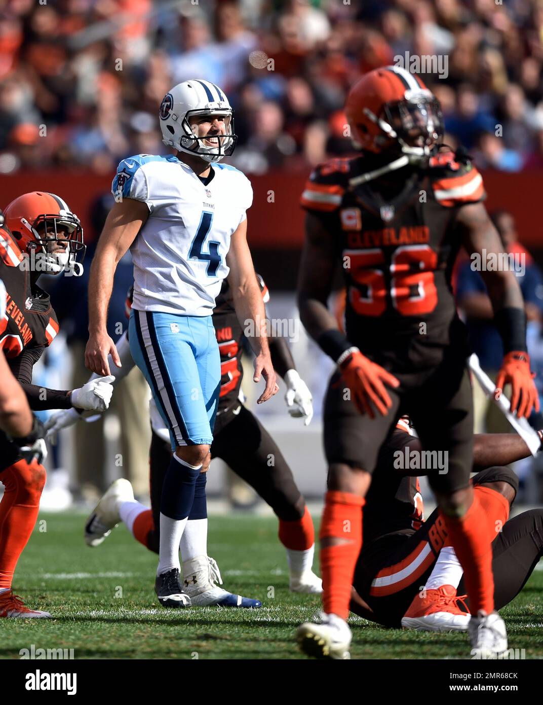 Tennessee Titans kicker Ryan Succop (4) watches the ball after kicking ...