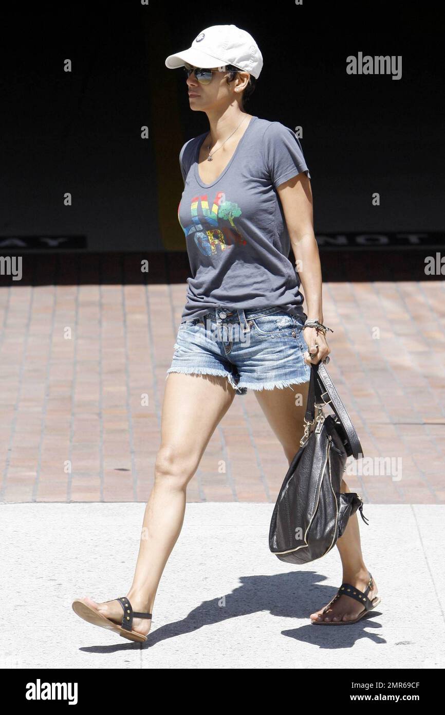 Newly single Halle Berry sports a pair of denim shorts that show off ...