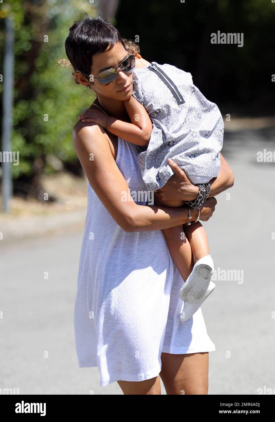 Halle Berry's daughter Nahla sleeps soundly on her mom's shoulder as ...