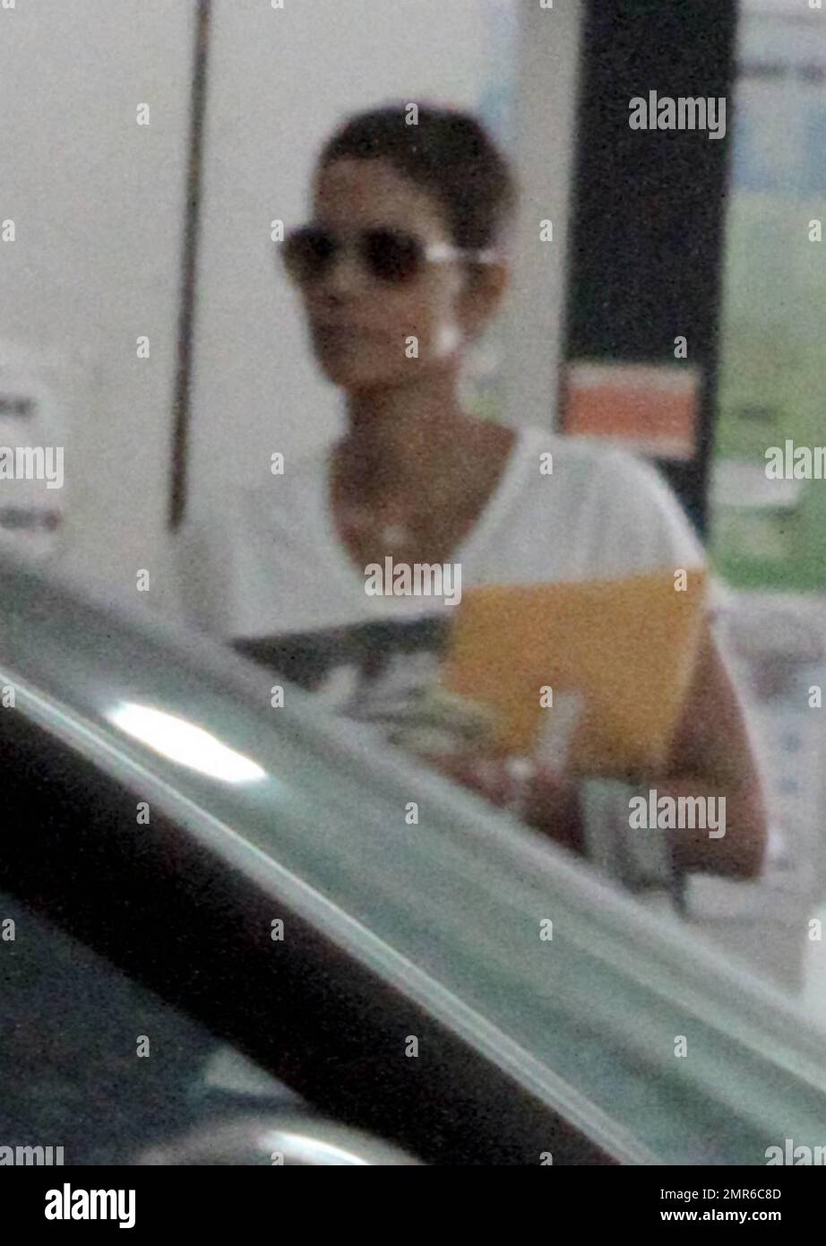 Exclusive Halle Berry Leaves A Plastic Surgery Building Touching Her Face After An Hour Long