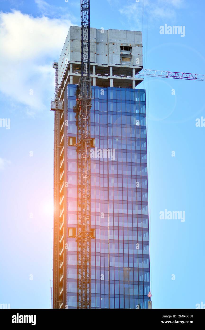 High-rise building under construction. Modern office building Stock ...