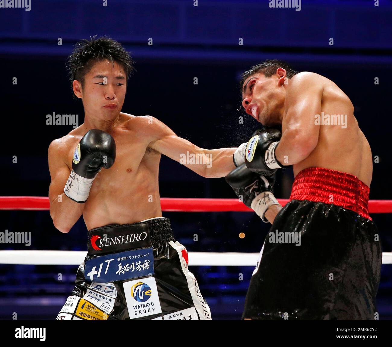 Japanese champion Ken Shiro, left, sends a left to Mexican challenger ...