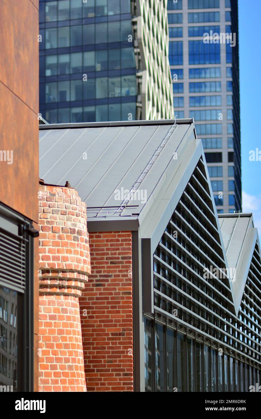 Abstract closeup of the glass-clad facade of a modern building covered ...
