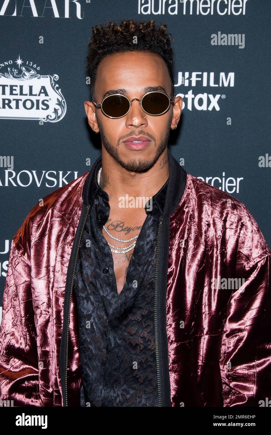 Lewis Hamilton attends the Harper's BAZAAR 'Icons by Carine Roitfeld ...