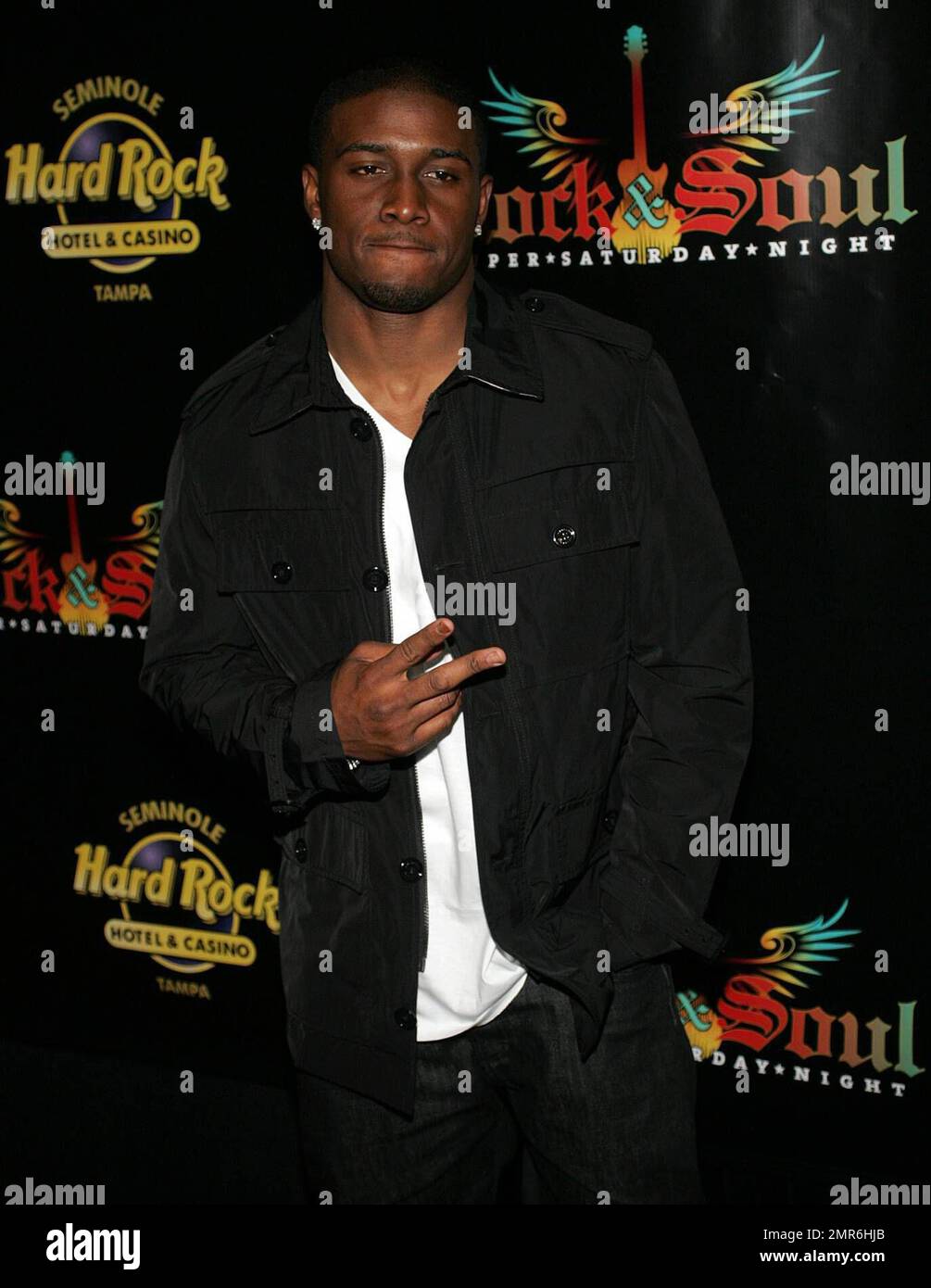 Football star Reggie Bush arrives on the red carpet for the Hard Rock ...