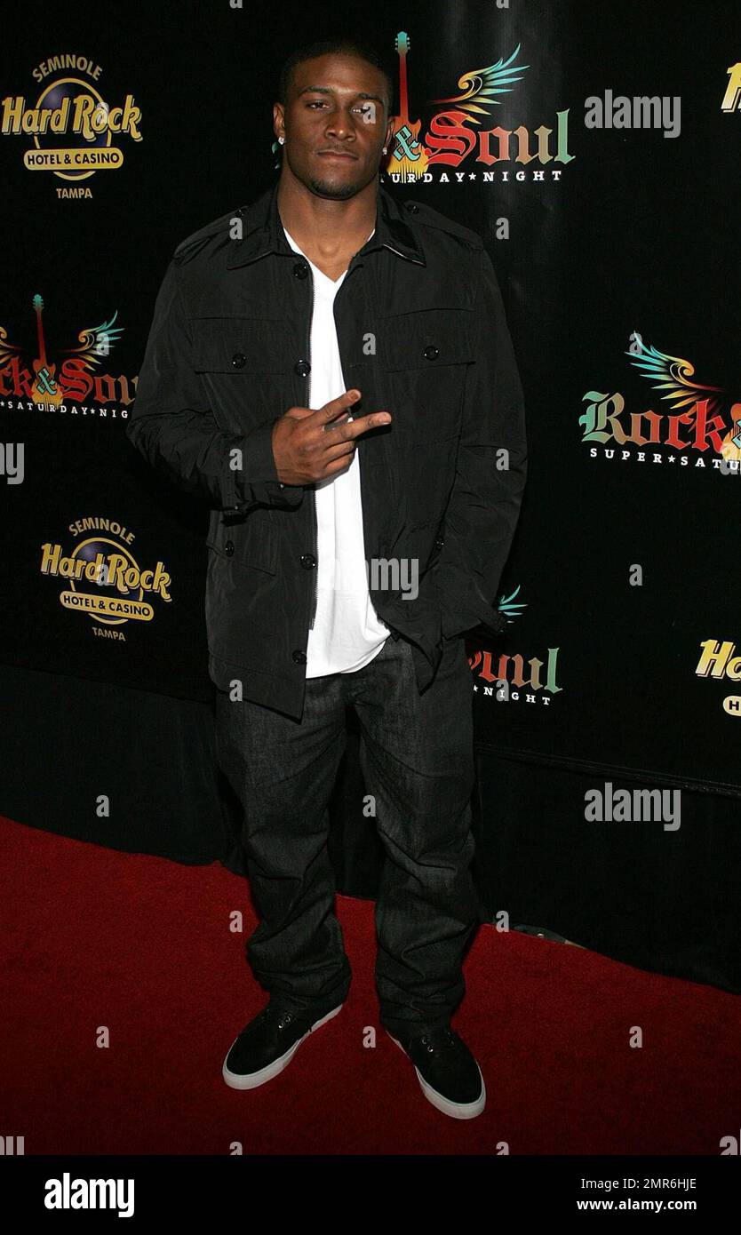 Football star Reggie Bush arrives on the red carpet for the Hard Rock ...