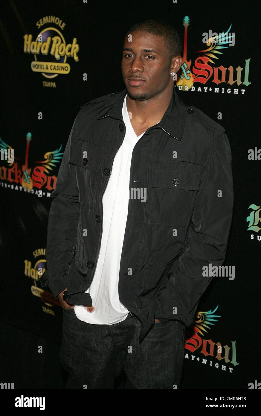 Football star Reggie Bush arrives on the red carpet for the Hard Rock ...