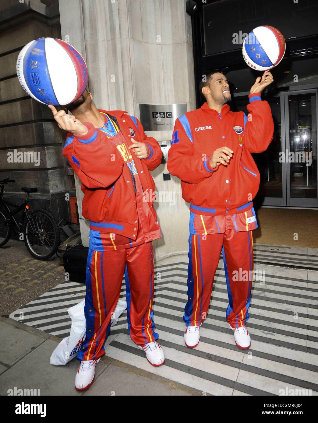 Two members of the world-famous Harlem Globetrotters show off thier ...