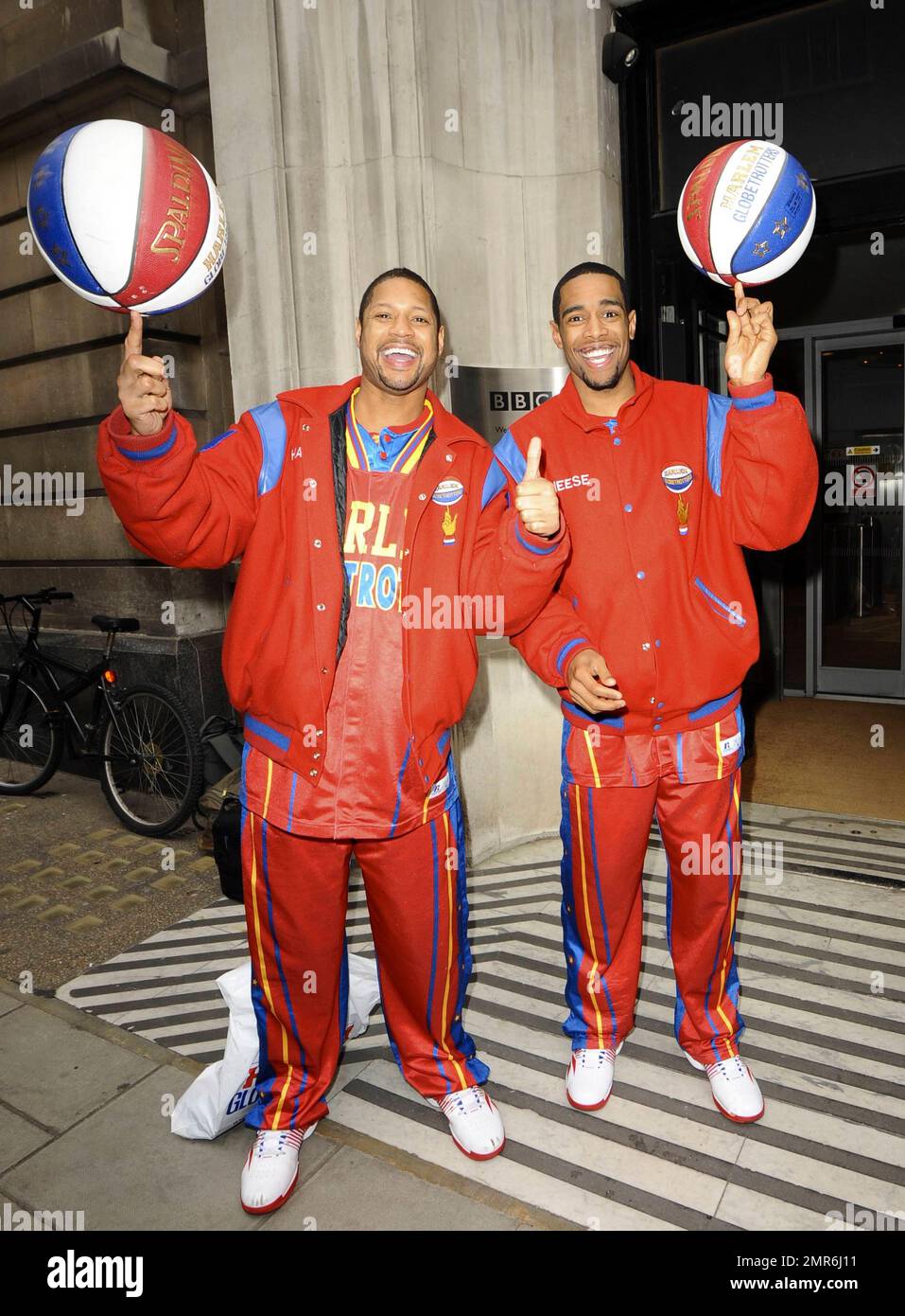 Two members of the world-famous Harlem Globetrotters show off thier ...