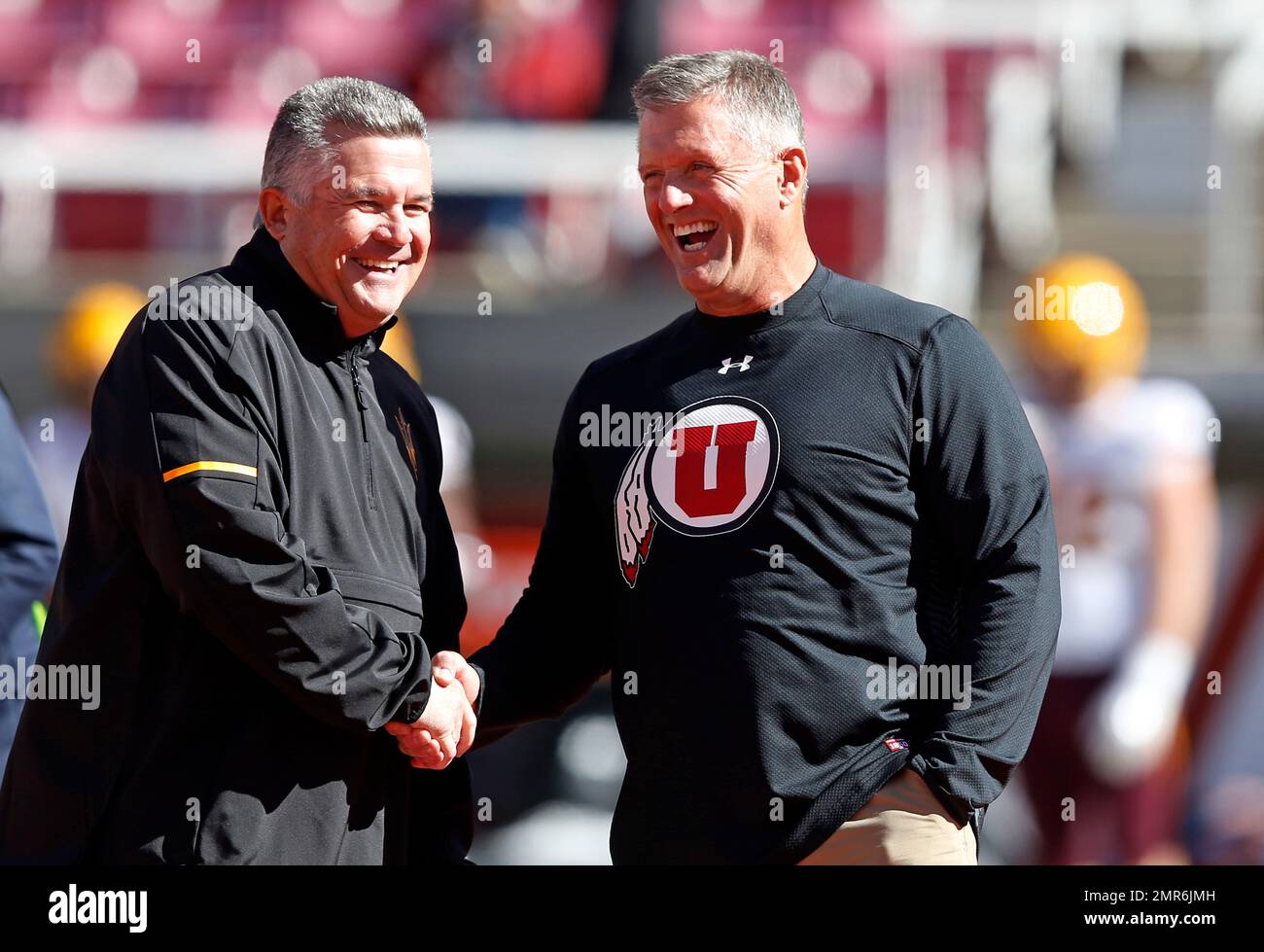 Arizona State head coach Todd Graham, left, and Utah head coach Kyle ...