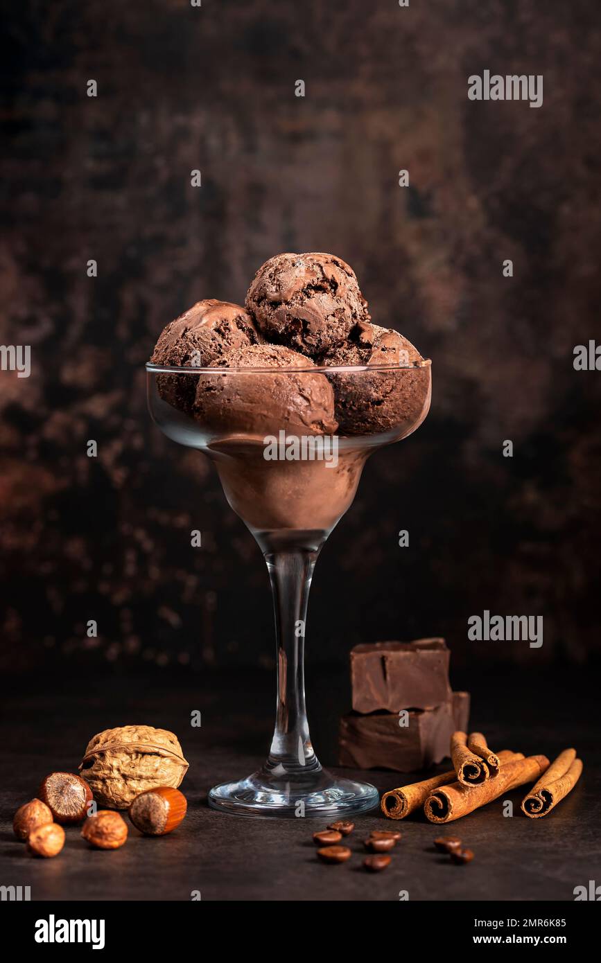 Food photography of chocolate ice cream, hazelnut, walnut, cinnamon ...