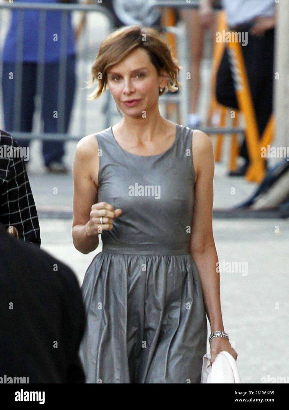 Wearing matching grey, Harrison Ford and his wife Calista Flockhart ...