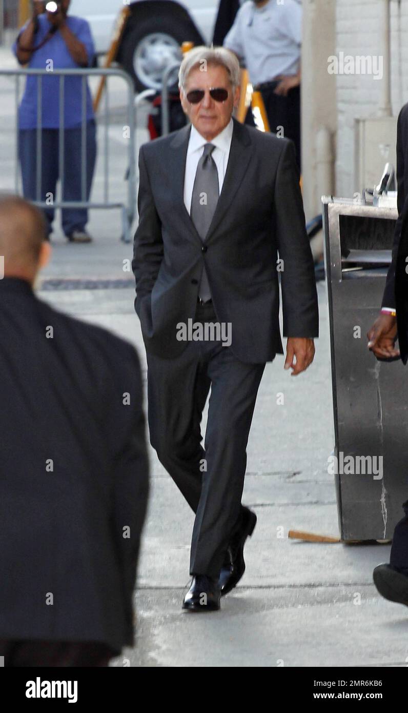 Wearing matching grey, Harrison Ford and his wife Calista Flockhart ...