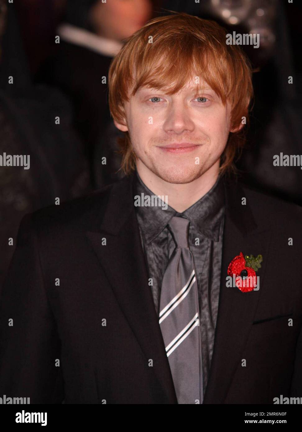 Rupert Grint poses on the red carpet at the world premiere of Warner ...