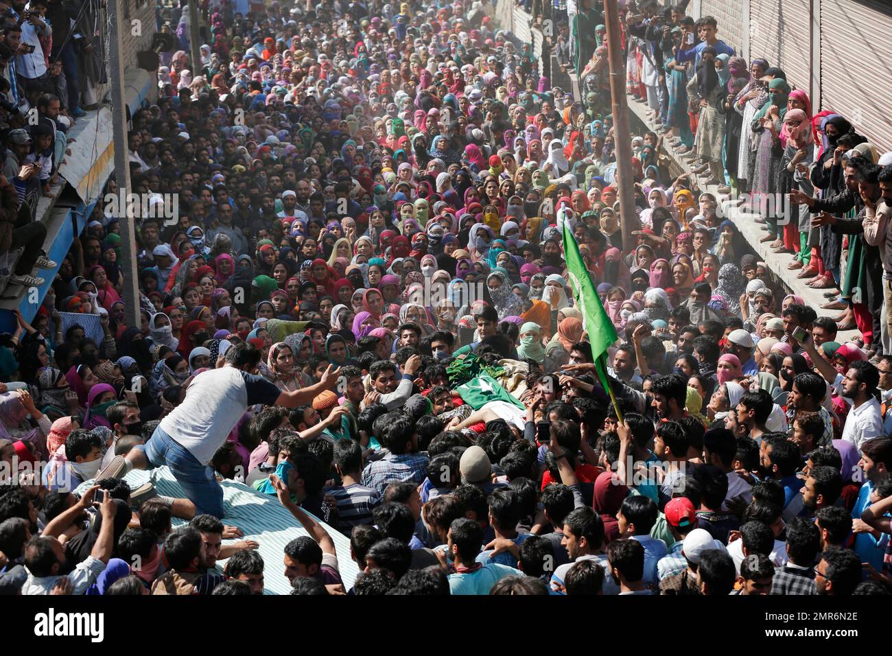 In this Tuesday, Oct. 10, 2017, file photo, villagers carry the body of ...