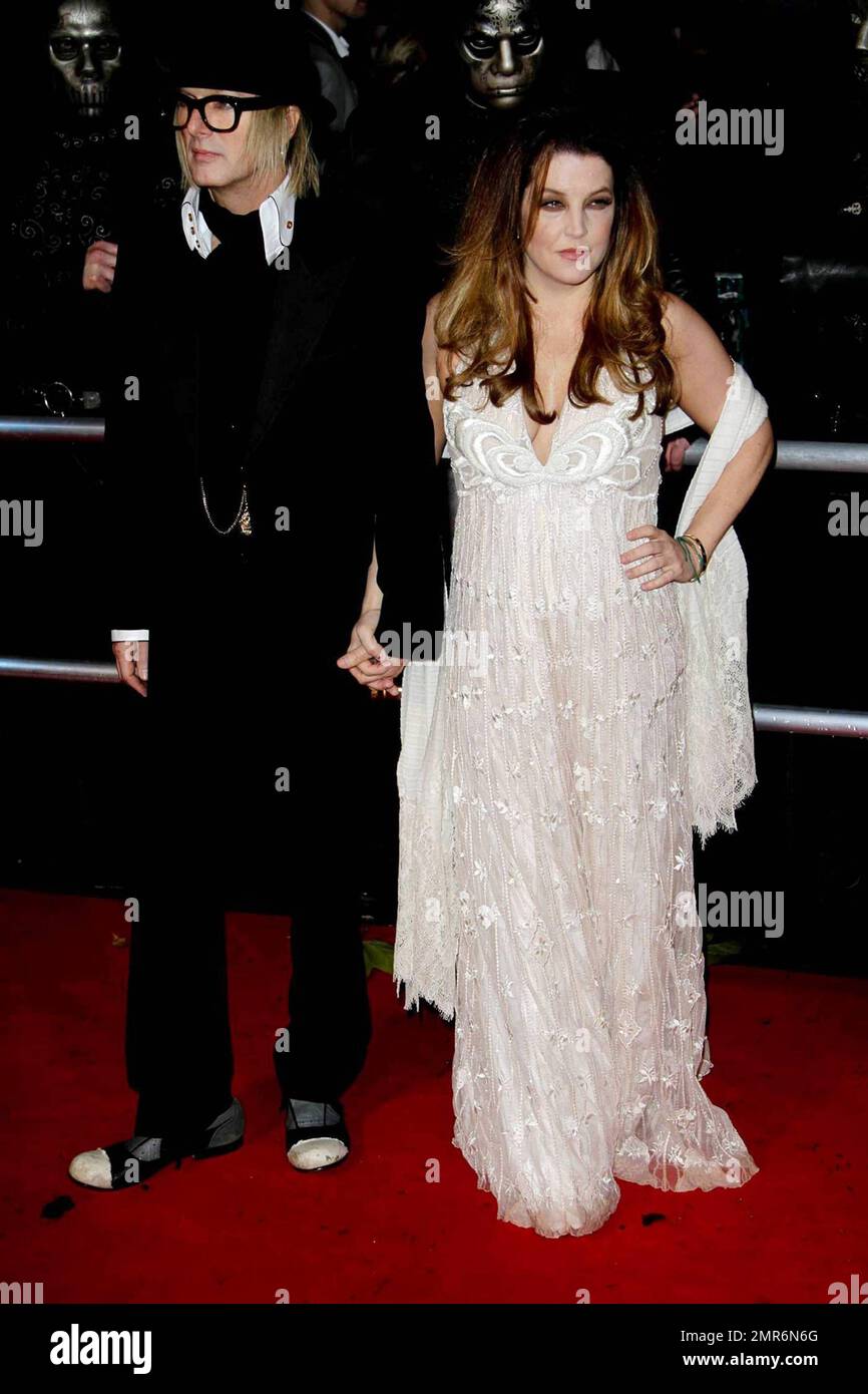Lisa Marie Presley and Michael Lockwood pose on the red carpet at the ...