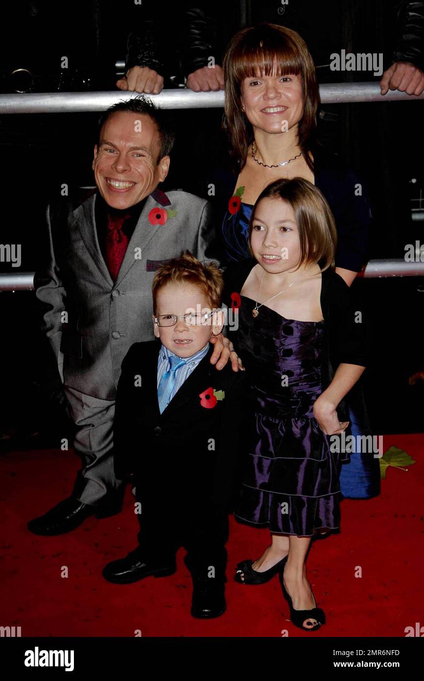 Warwick Davis and wife Samantha Davis pose on the red carpet at the ...