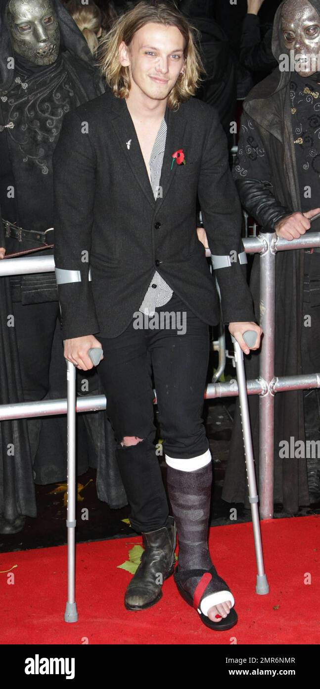 Jamie Campbell Bower poses on the red carpet at the world premiere of ...