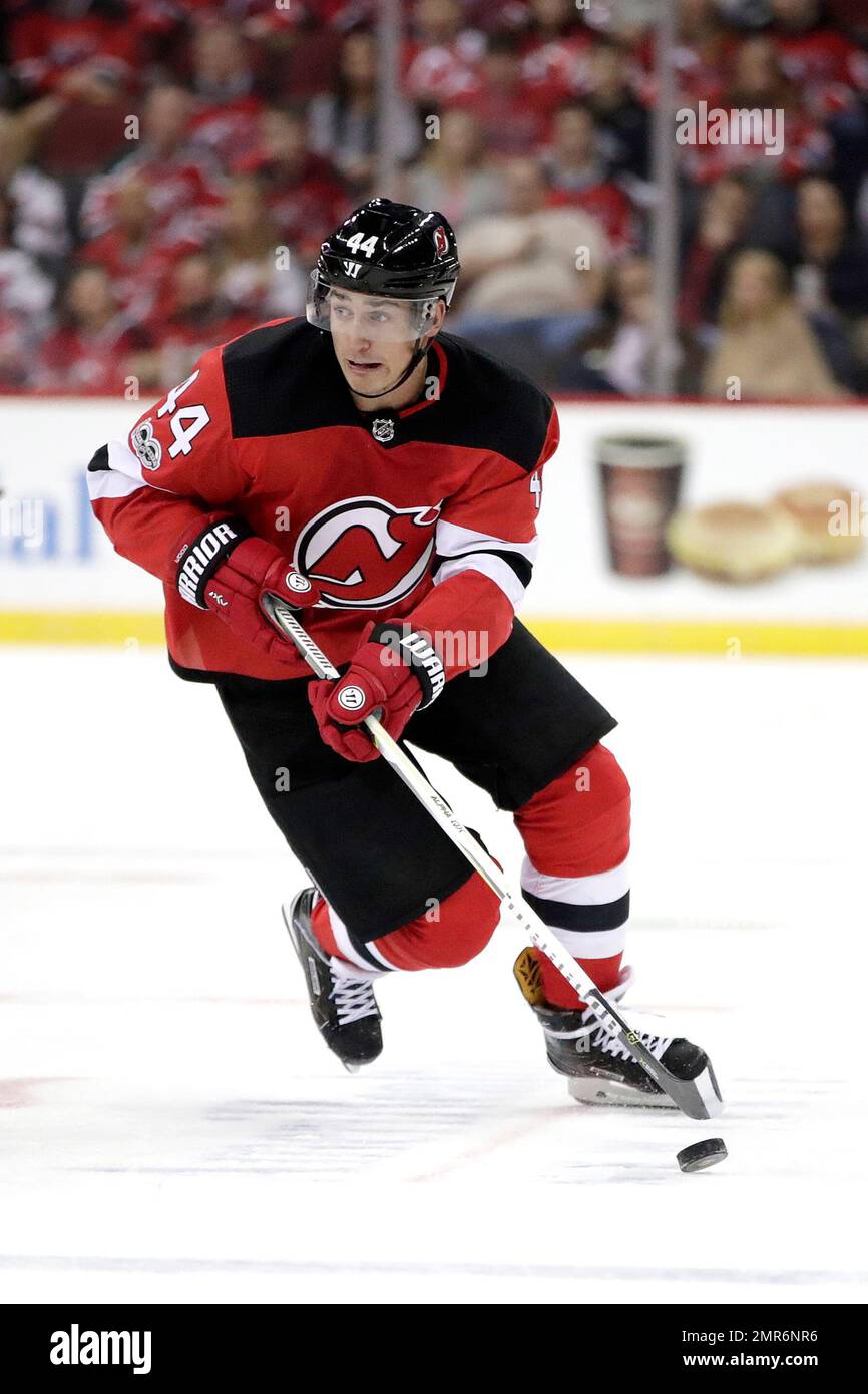 New Jersey Devils left wing Miles Wood skates against the San Jose ...