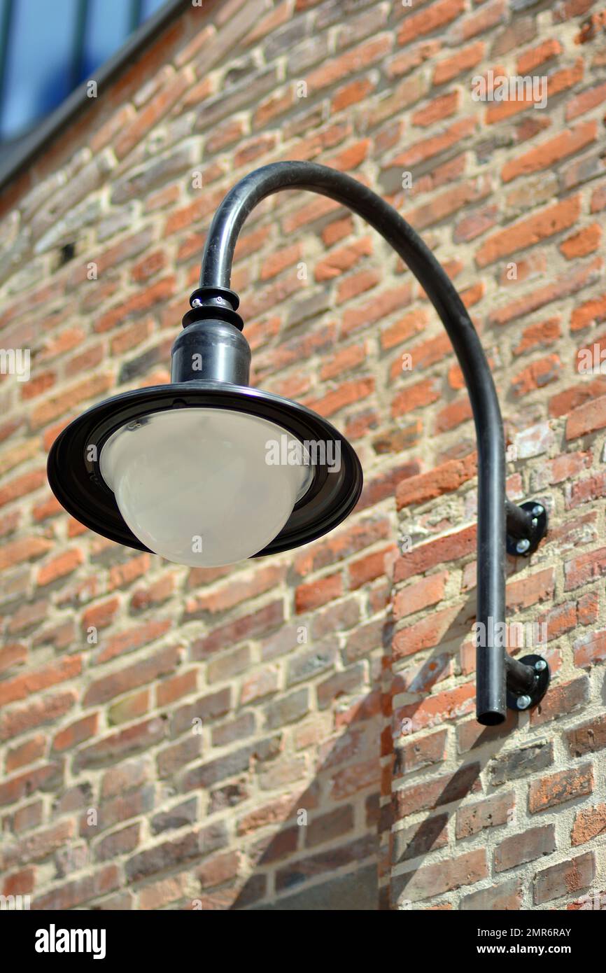 Street lamp on the wall in public street Stock Photo - Alamy