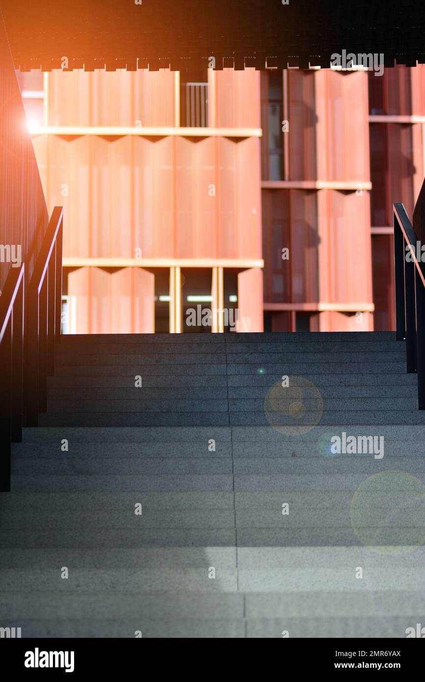 Modern concrete stairs and metal railings outside Stock Photo - Alamy