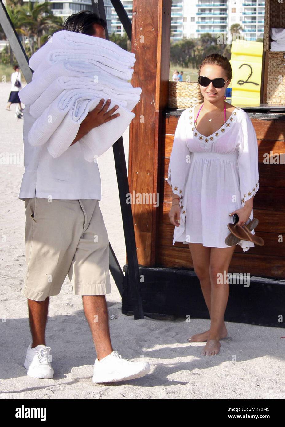 American actress and singer, Hayden Panettiere enjoys the sand with ...