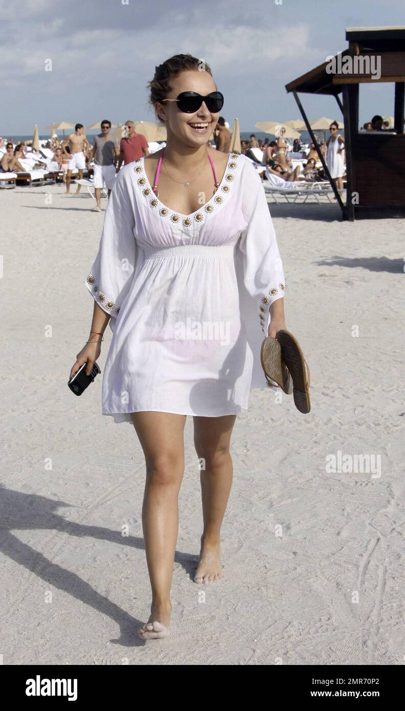 American actress and singer, Hayden Panettiere enjoys the sand with ...