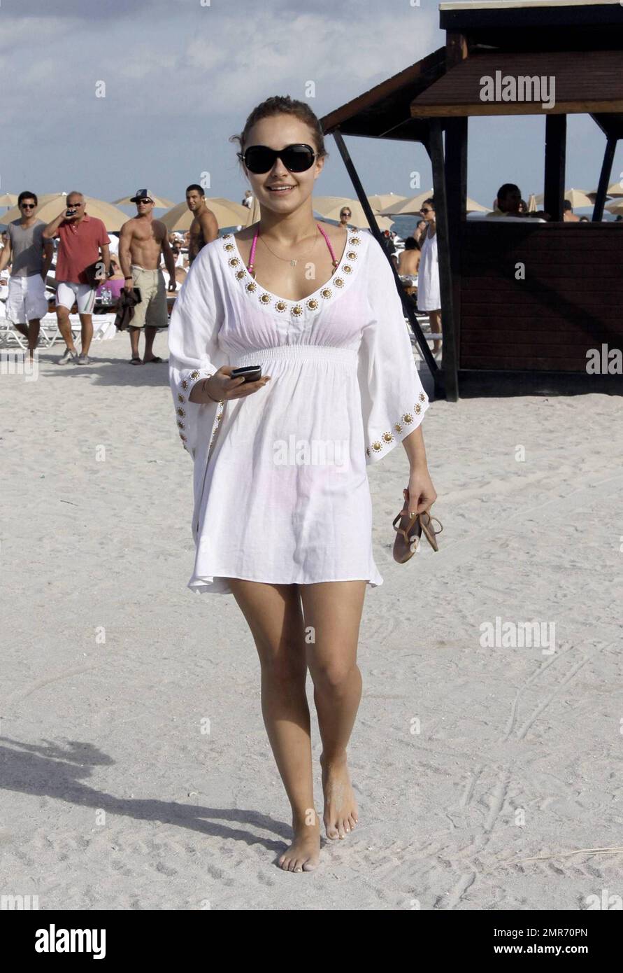 - American actress and singer, Hayden Panettiere enjoys the sand with ...