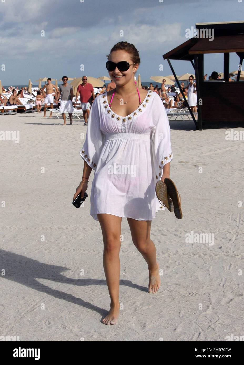 - American actress and singer, Hayden Panettiere enjoys the sand with ...