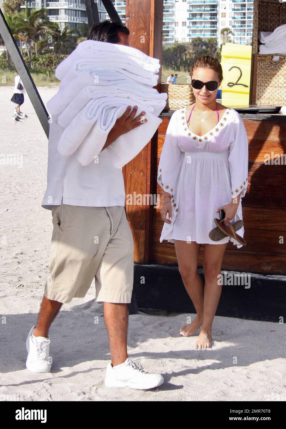 - American actress and singer, Hayden Panettiere enjoys the sand with ...