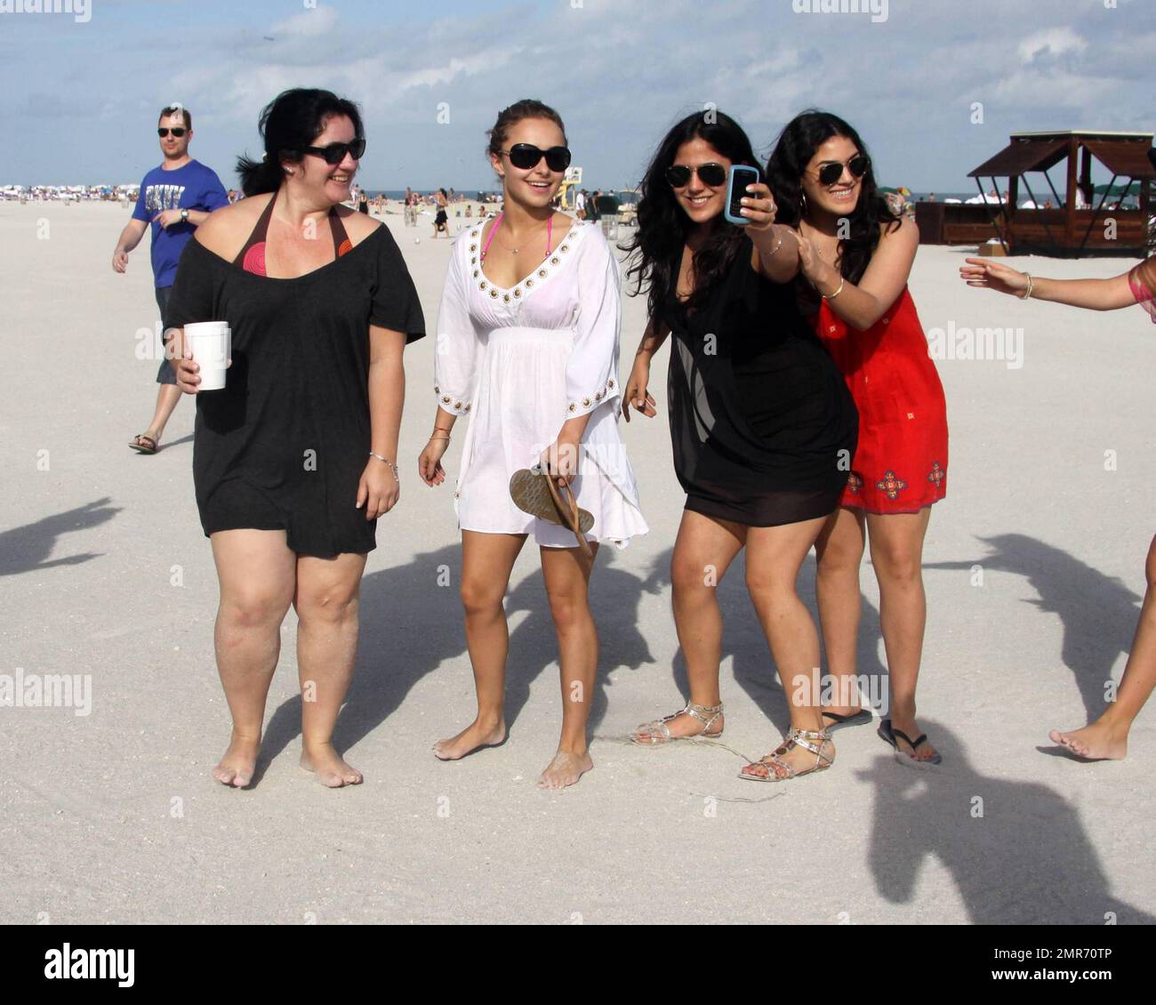 - American actress and singer, Hayden Panettiere enjoys the sand with ...