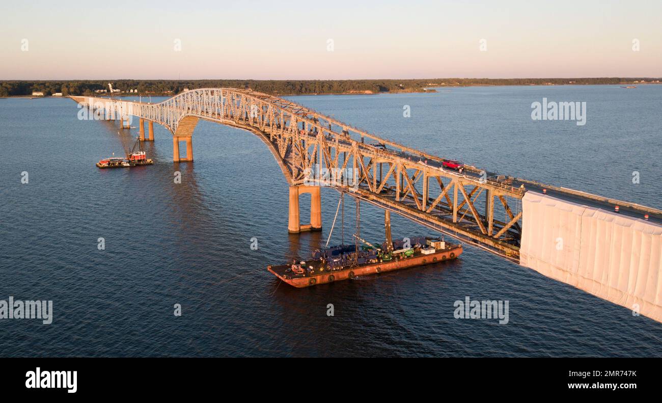 Traffic makes it way across the Robert O. Norris bridge as workers ...