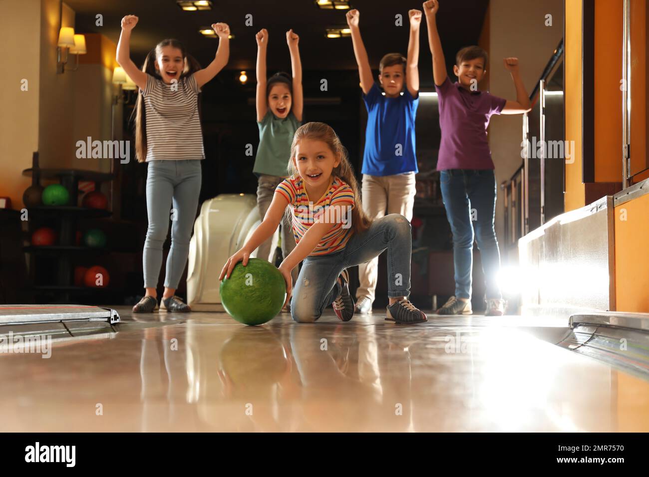 Children throwing ball together hi-res stock photography and images - Alamy