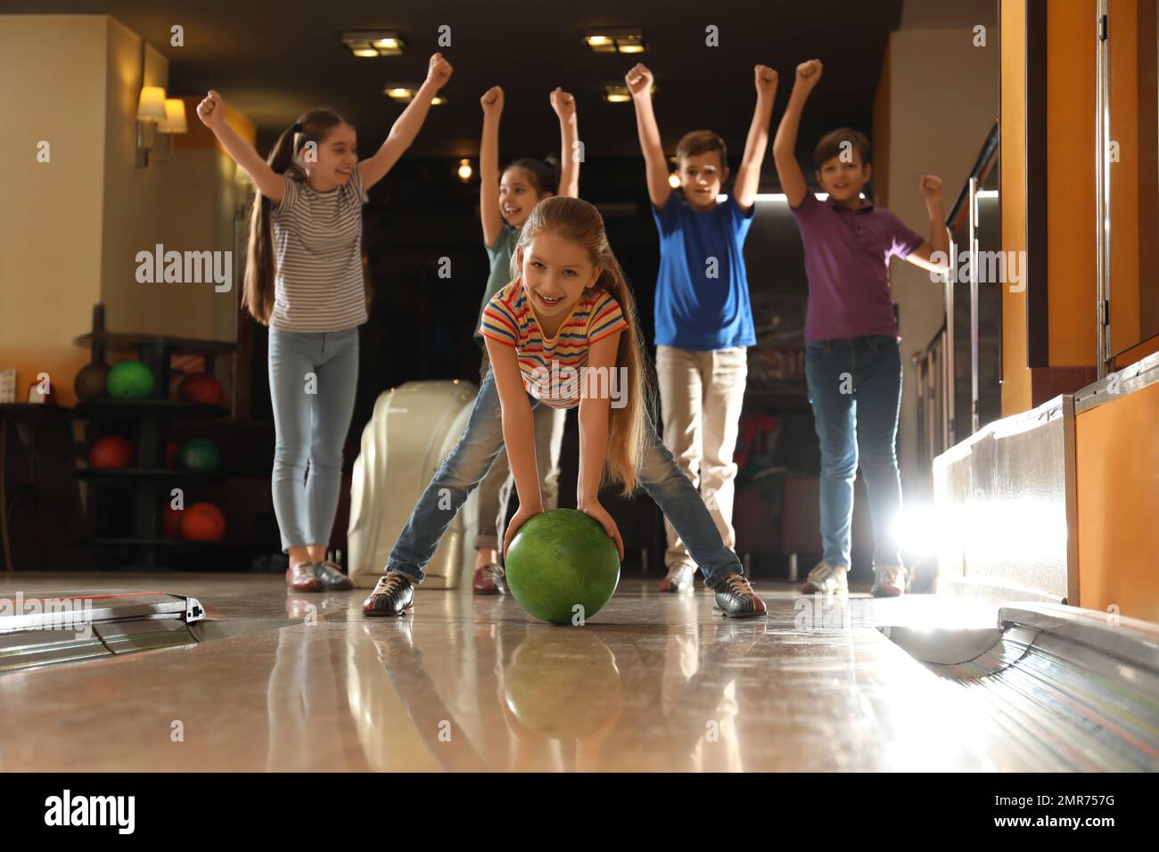 Children throwing ball together hi-res stock photography and images - Alamy