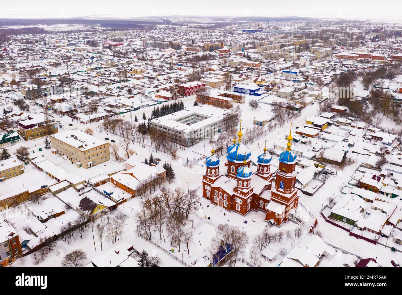 Snow covered Petrovsk cityscape with Church of Intercession of Holy ...