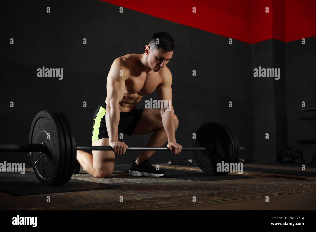 Confident man lifting barbell hi-res stock photography and images - Alamy