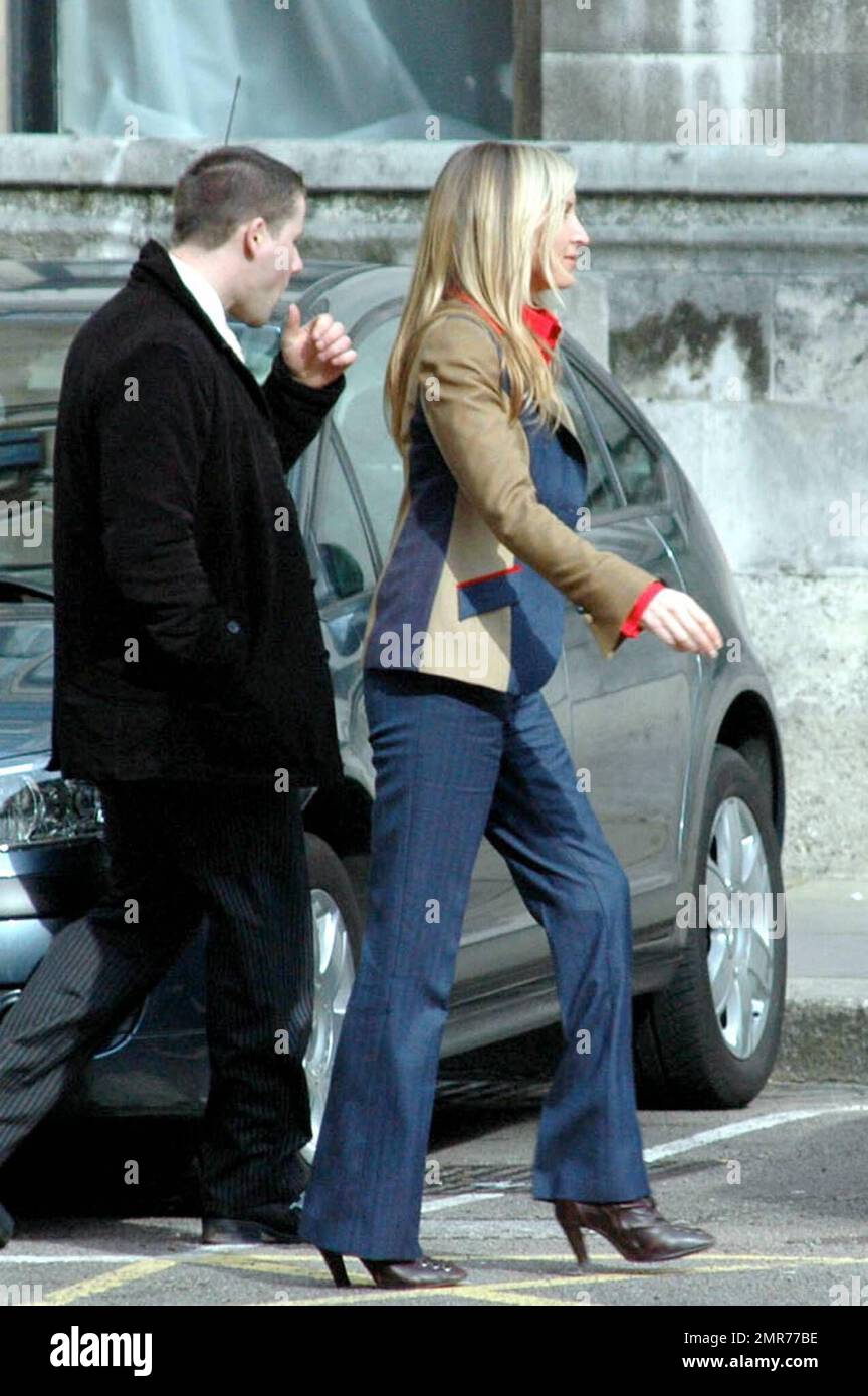 Heather Mills leaves court after a judge awarded her a reported $48.6 ...