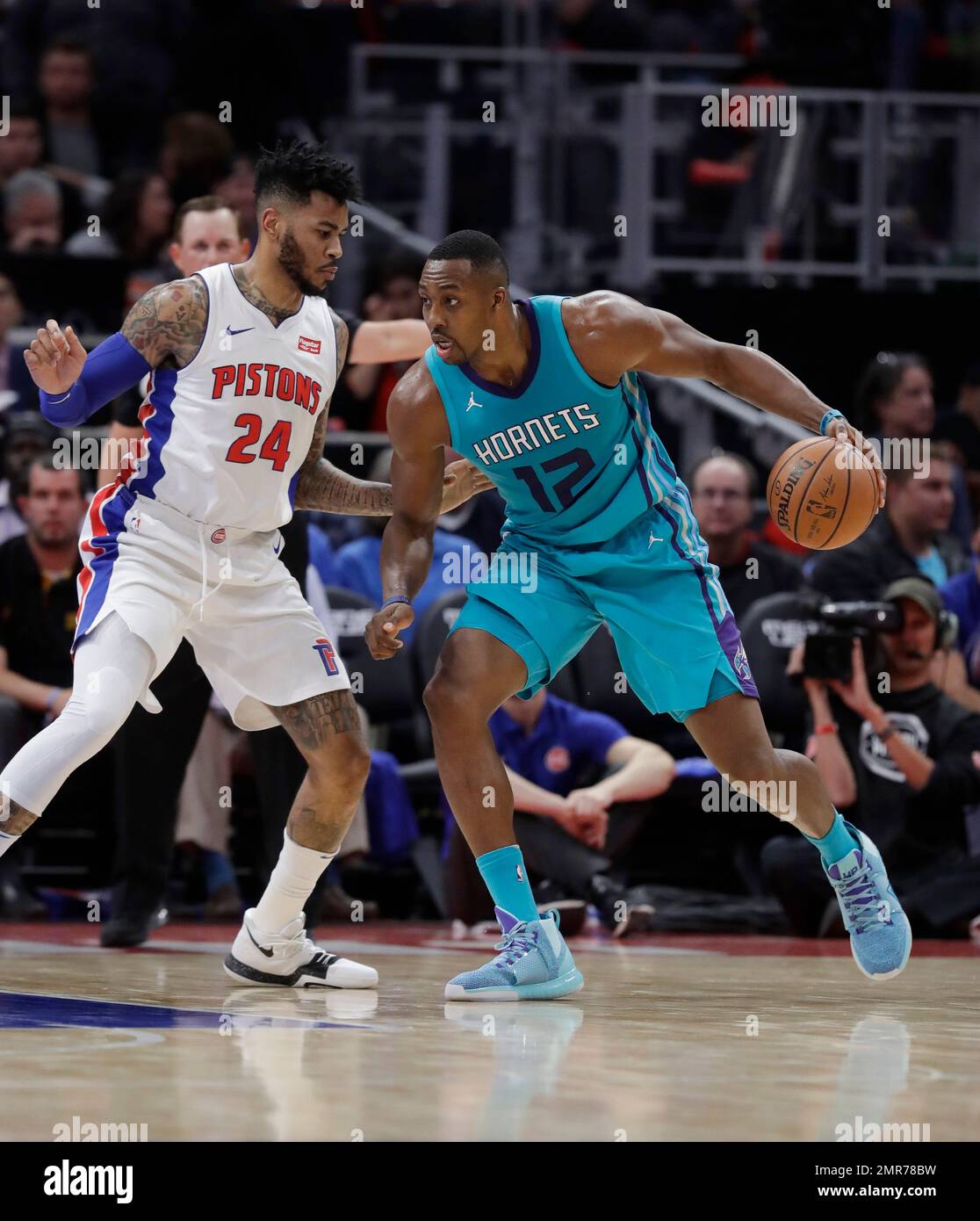 Detroit Pistons forward Eric Moreland (24) defends Charlotte Hornets ...