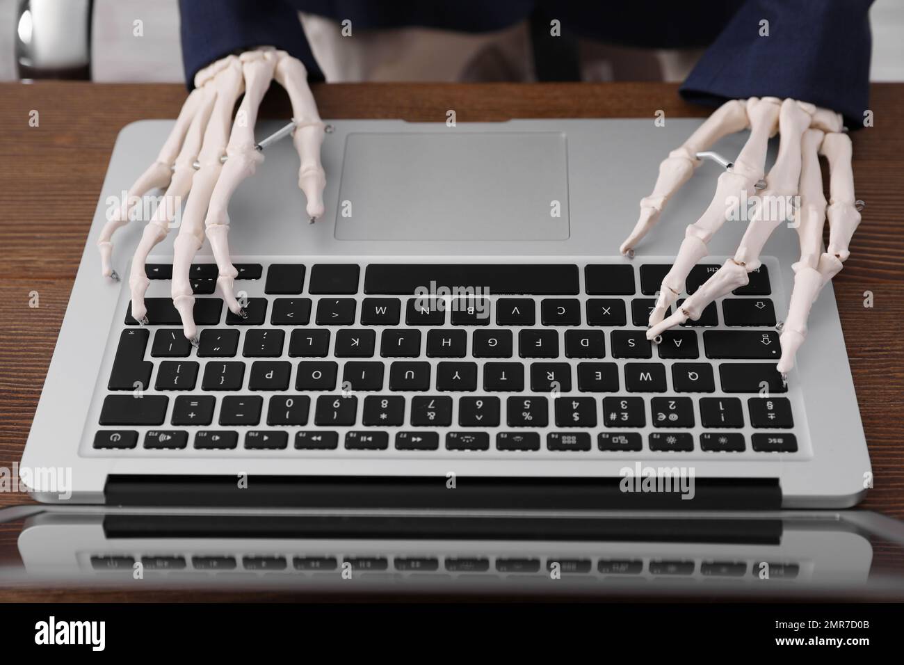 Skeleton in suit hi-res stock photography and images - Alamy